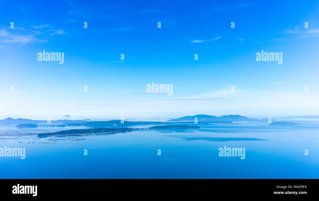 Orcas islands and still water in Samish Bay, Washington Stock Photo - Alamy