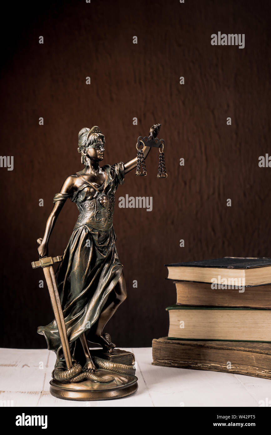 Lady justice statue law table hi-res stock photography and images - Alamy