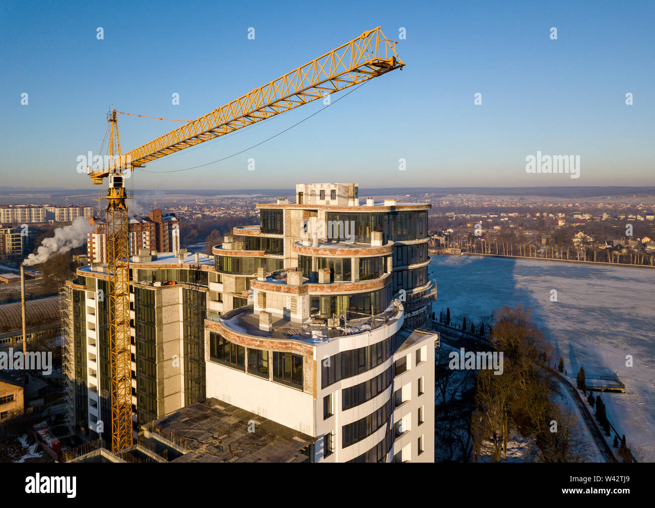 Apartment or office tall building under construction, top view. Tower ...