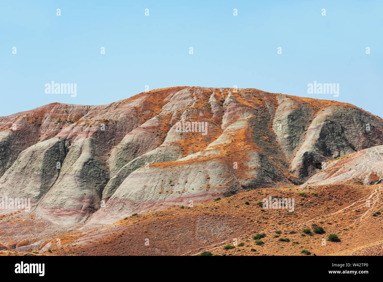 Amazing beautiful slopes of red mountains Stock Photo - Alamy