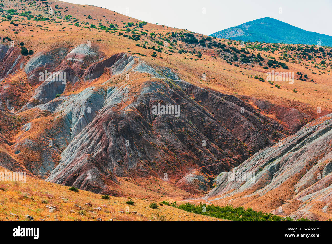 Amazing beautiful slopes of red mountains Stock Photo - Alamy