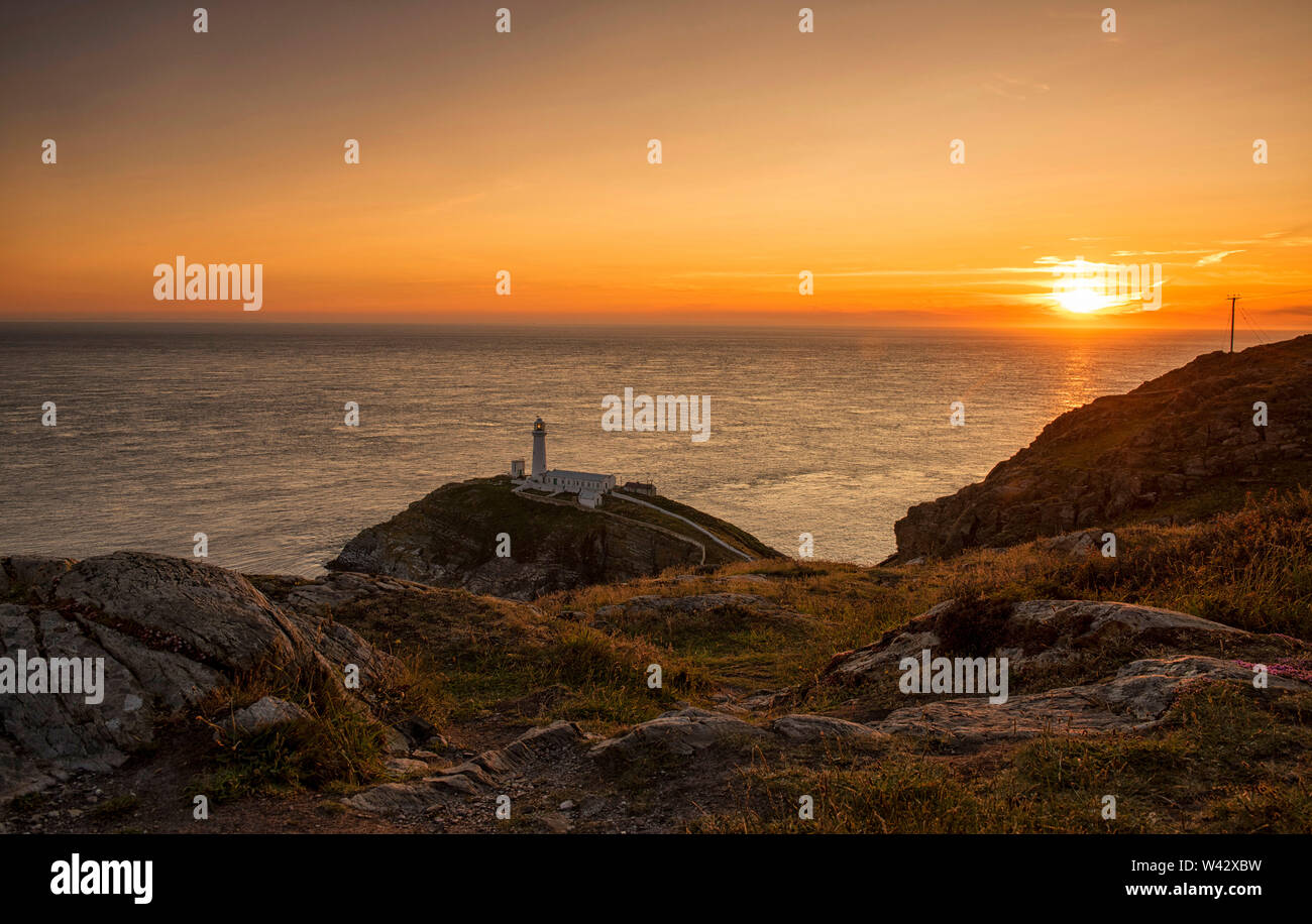 Sunset at South Stack Lighthouse on the Island of Anglesey, Wales UK ...