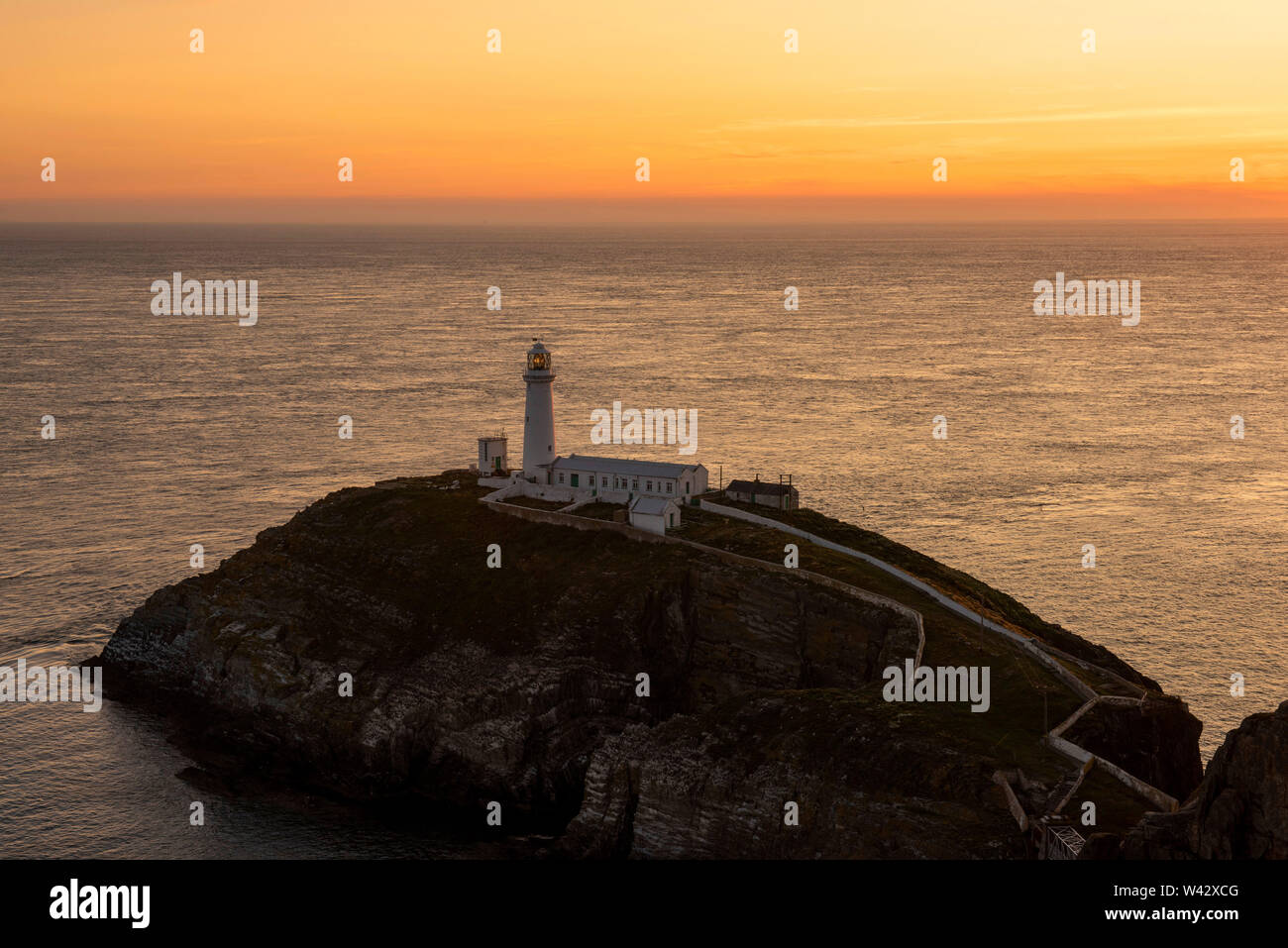 Sunset at South Stack Lighthouse on the Island of Anglesey, Wales UK ...