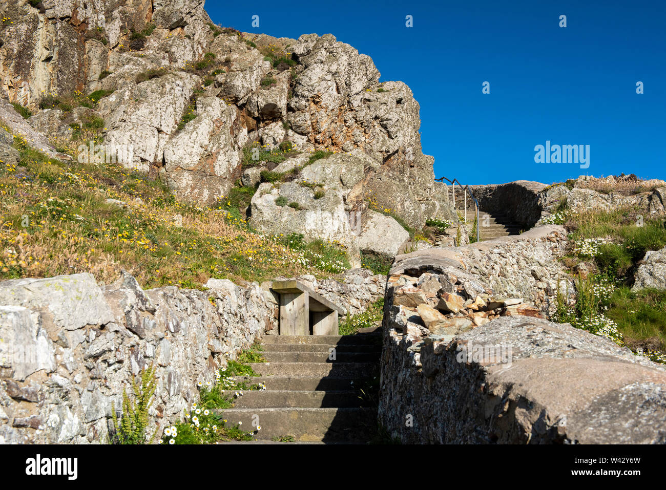 Winding stone path down to South Stack on the Island of Anglesey, Wales ...