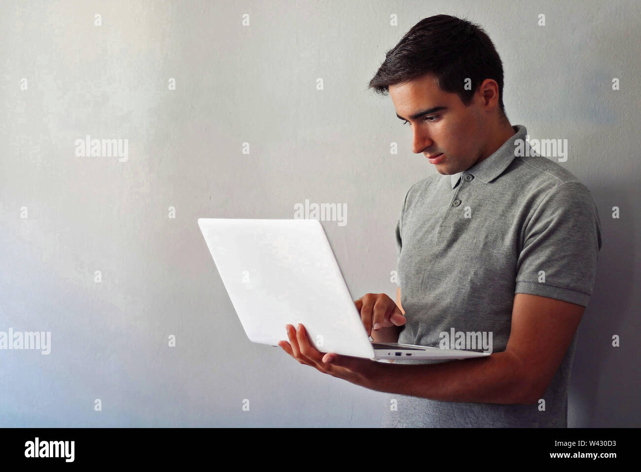 Businessman using laptop writing in hi-res stock photography and images - Alamy