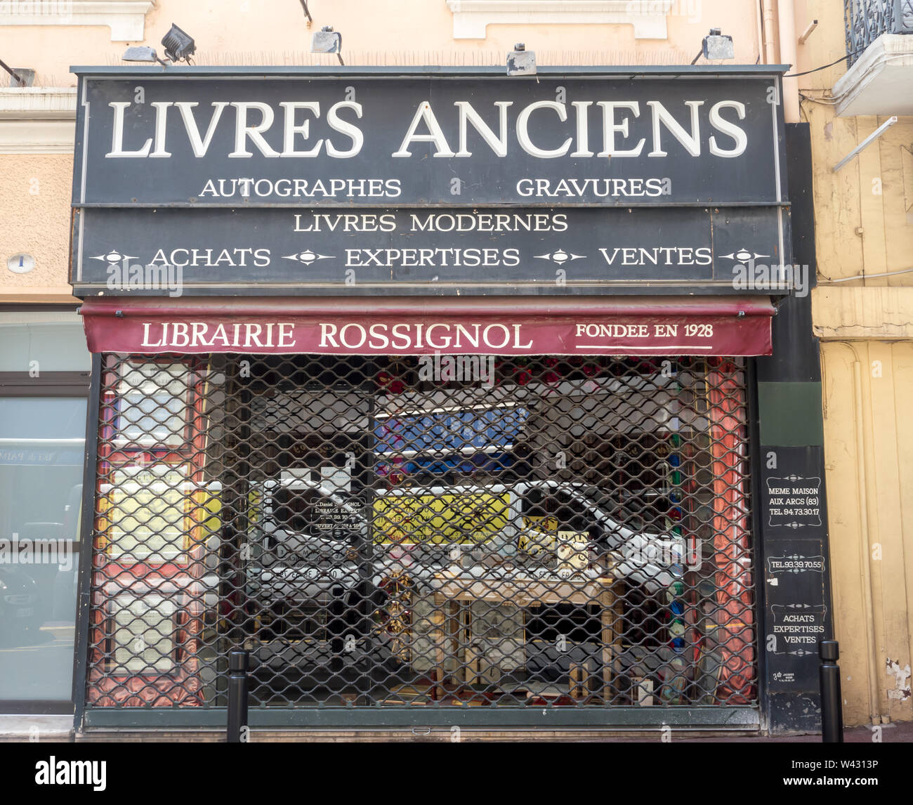 Old french store front hi-res stock photography and images - Alamy