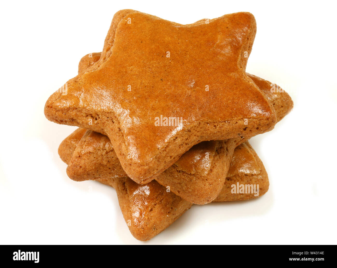 Gingerbread star shaped cookies stack isolated over white Stock Photo ...