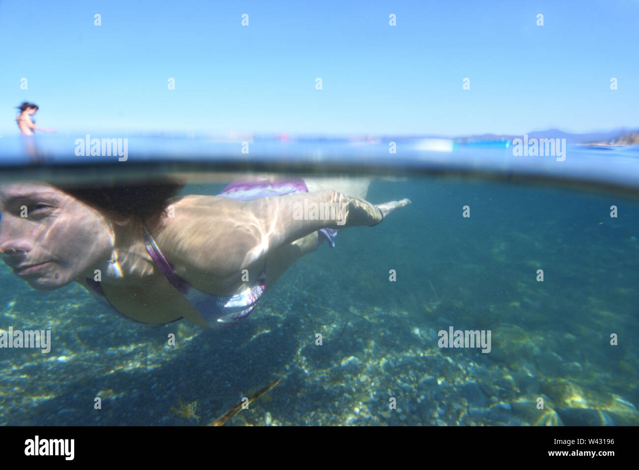 woman diving on the sea Stock Photo - Alamy