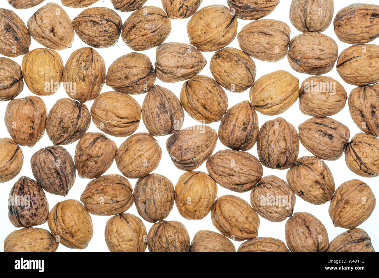 Texture with nuts. Isolated on white background Stock Photo - Alamy