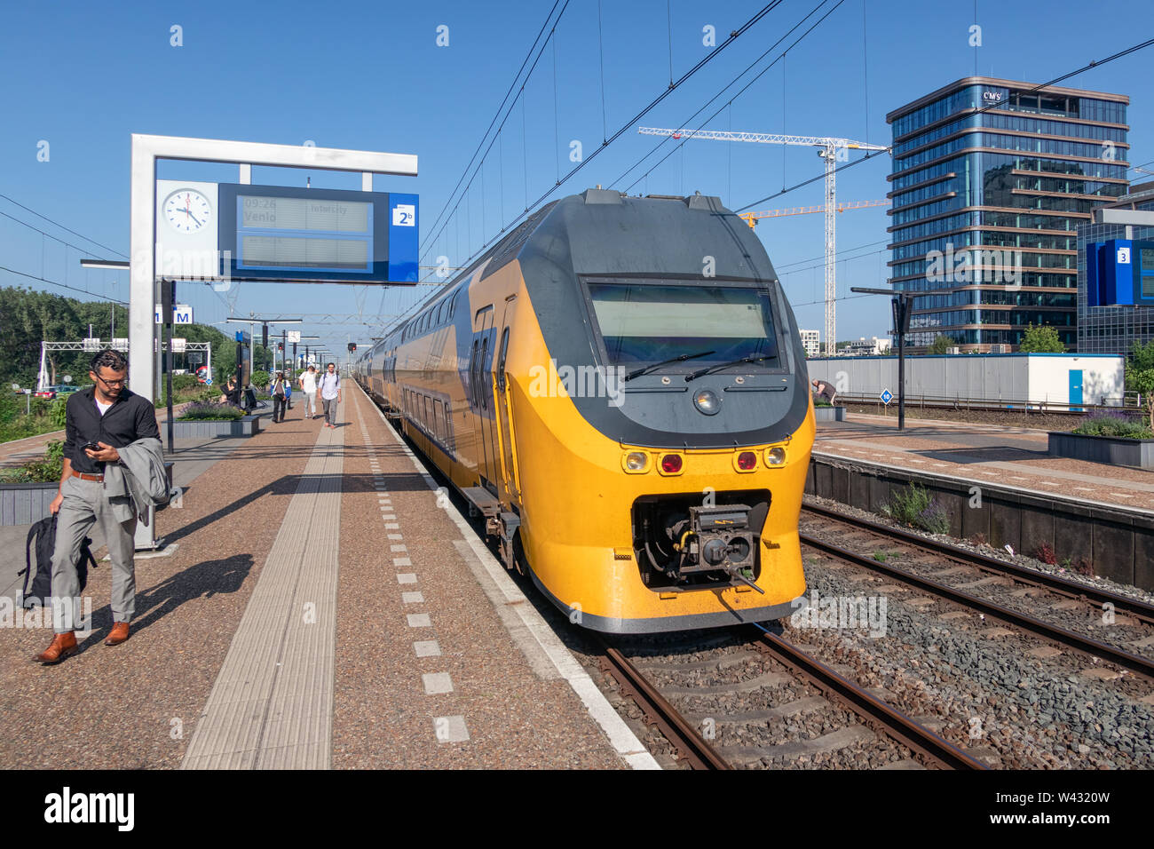 Express train waiting at railway station Amsterdam Zuid, the ...