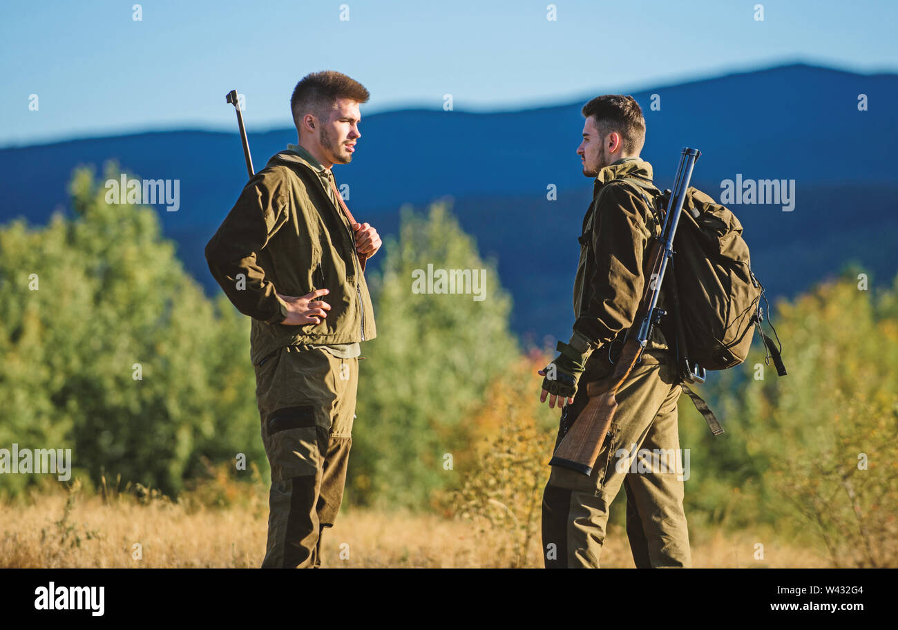 Friendship of men hunters. Military uniform. Army forces. Camouflage ...