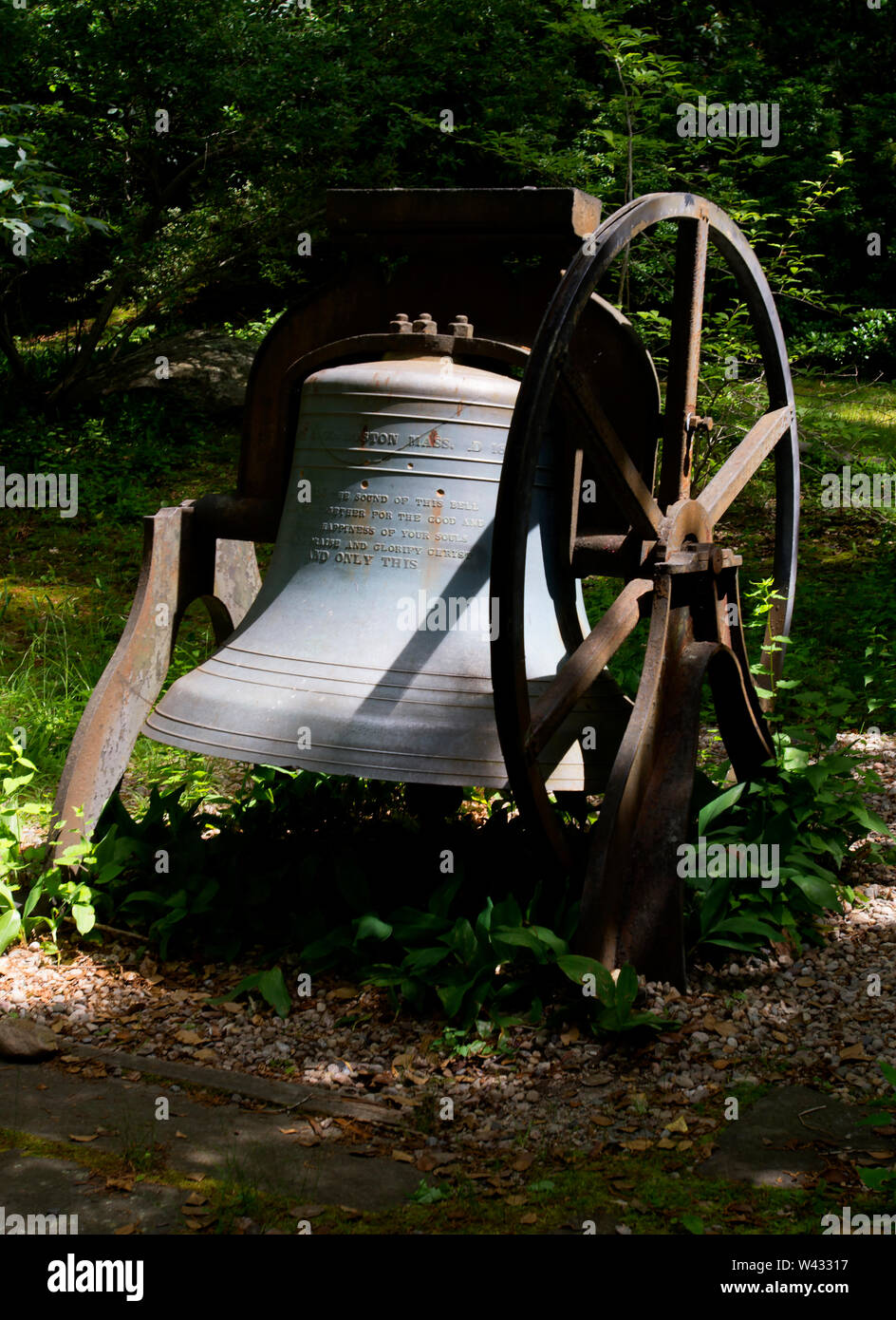 An antique bell in the Spohr Gardens in Falmouth Massachusetts on Cape ...
