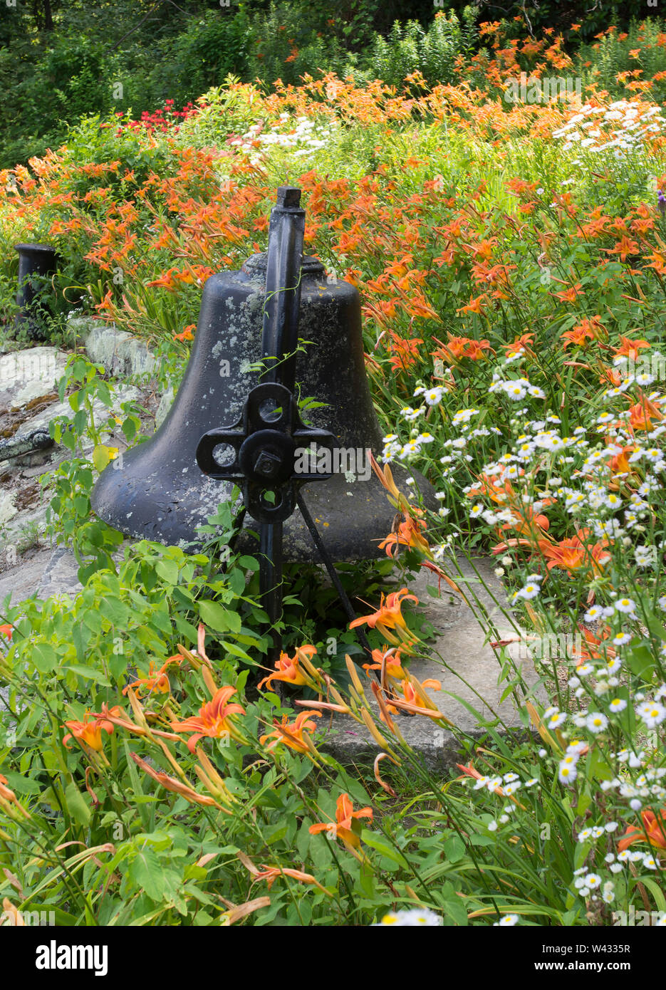 An antique bell in the Spohr Gardens in Falmouth Massachusetts on Cape ...