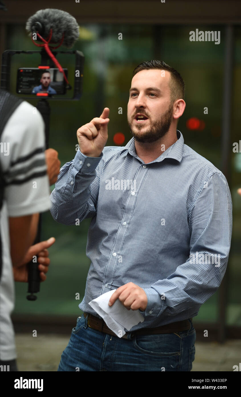James Goddard does a piece to camera while leaving Westminster ...