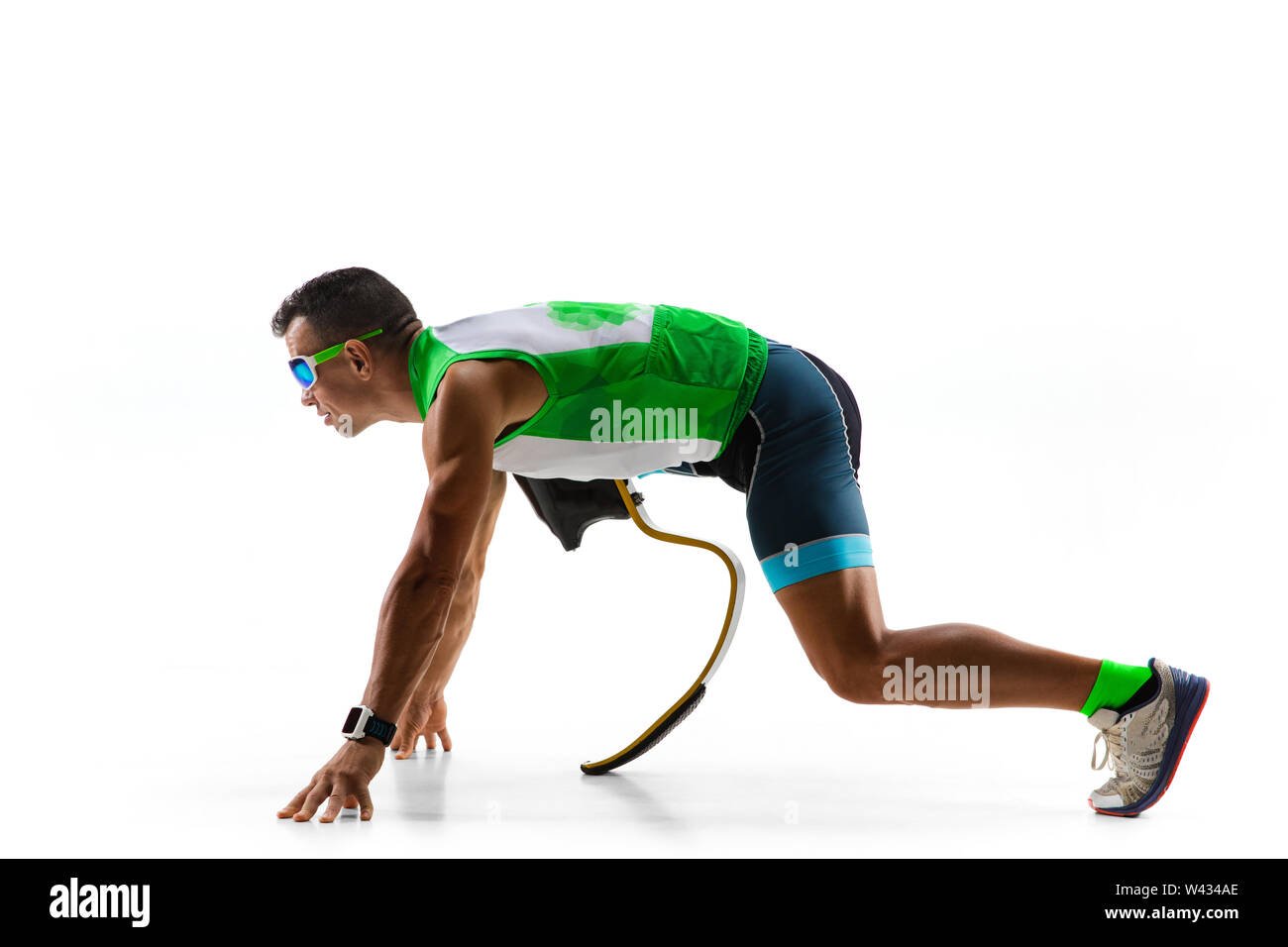 Athlete with disabilities or amputee isolated on white studio ...