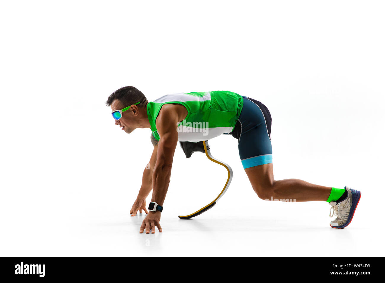 Athlete with disabilities or amputee isolated on white studio ...