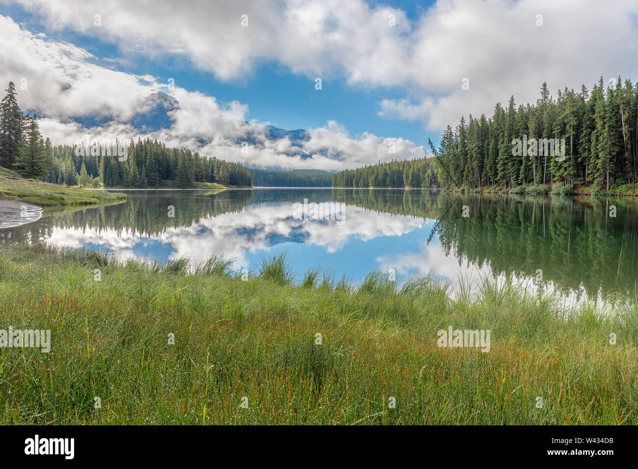 Clouds at Johnson Lake in Banff National Park, Alberta, Canada Stock ...