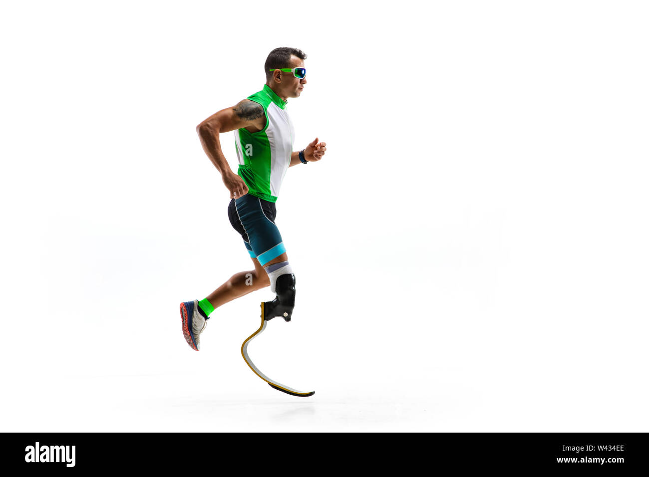 Athlete with disabilities or amputee isolated on white studio ...