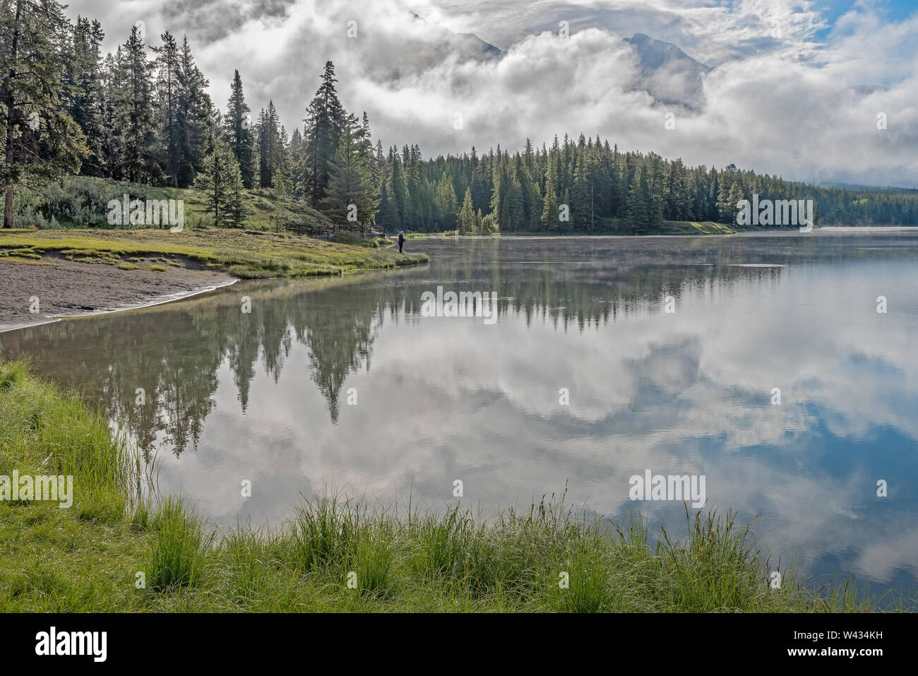 Clouds at Johnson Lake in Banff National Park, Alberta, Canada Stock ...