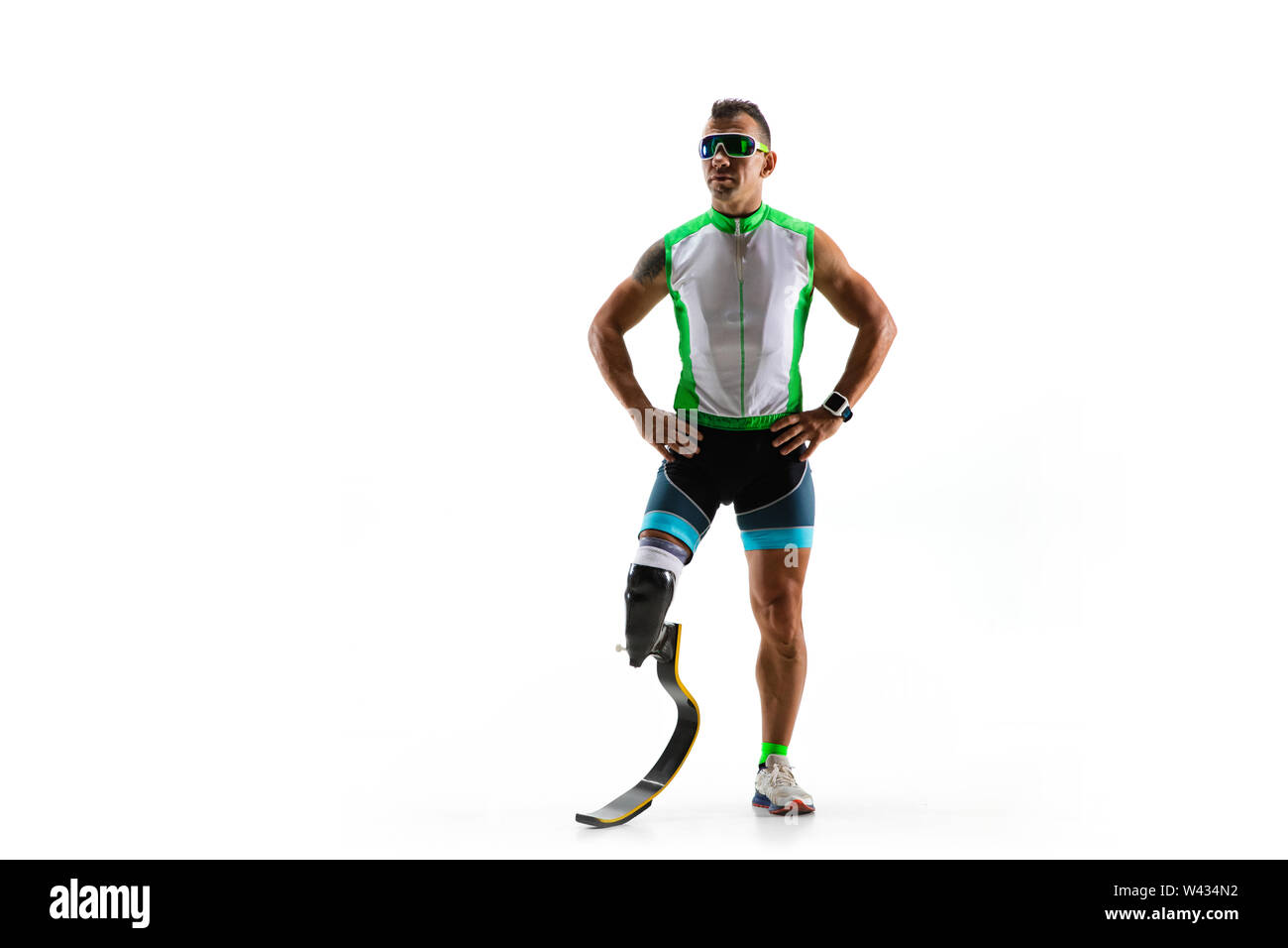 Athlete with disabilities or amputee isolated on white studio ...