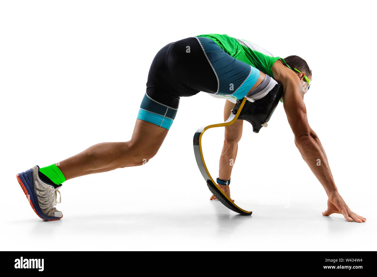 Athlete with disabilities or amputee isolated on white studio ...