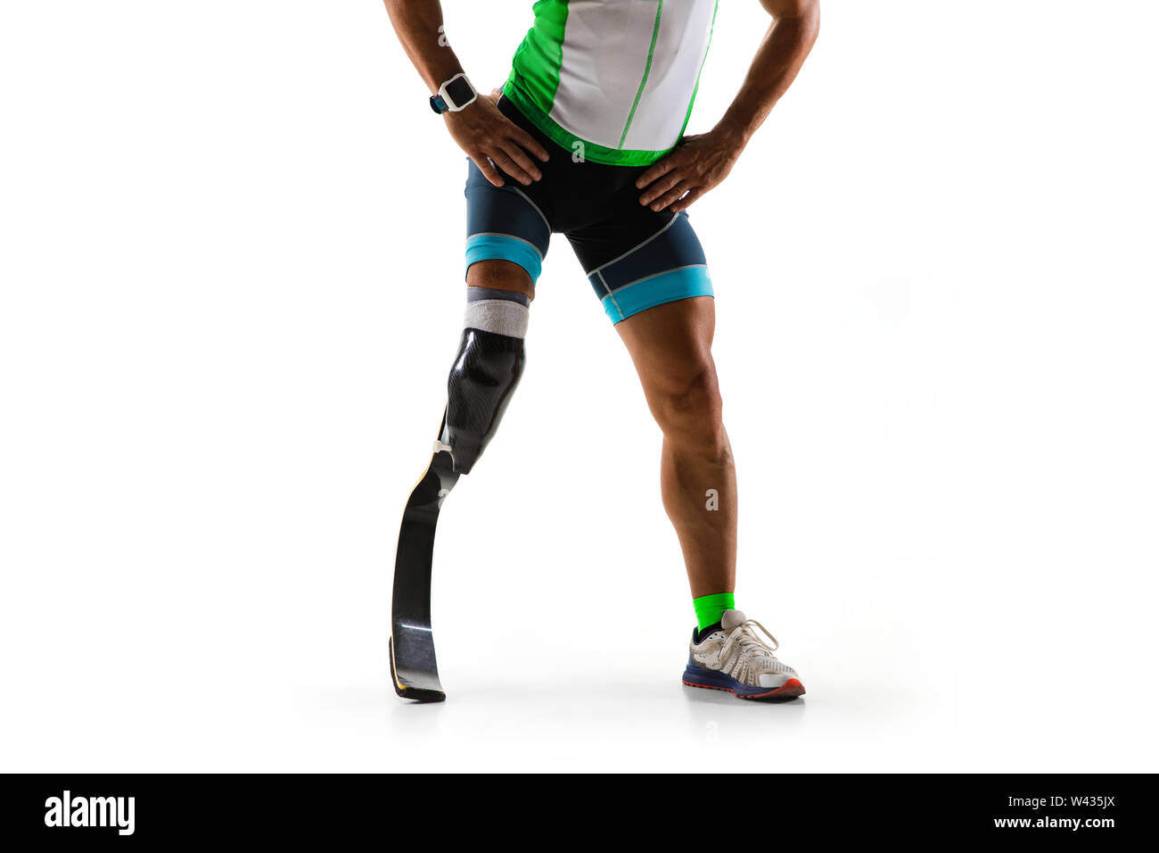 Athlete with disabilities or amputee isolated on white studio ...
