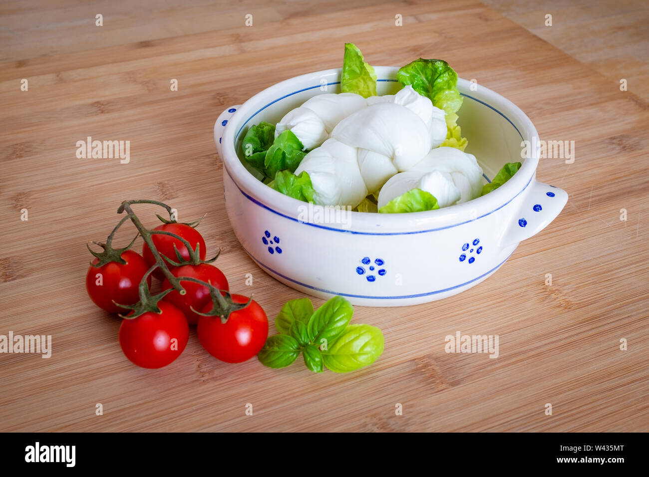 Cow's milk mozzarella cheese handmade in Puglia served in a typical ...
