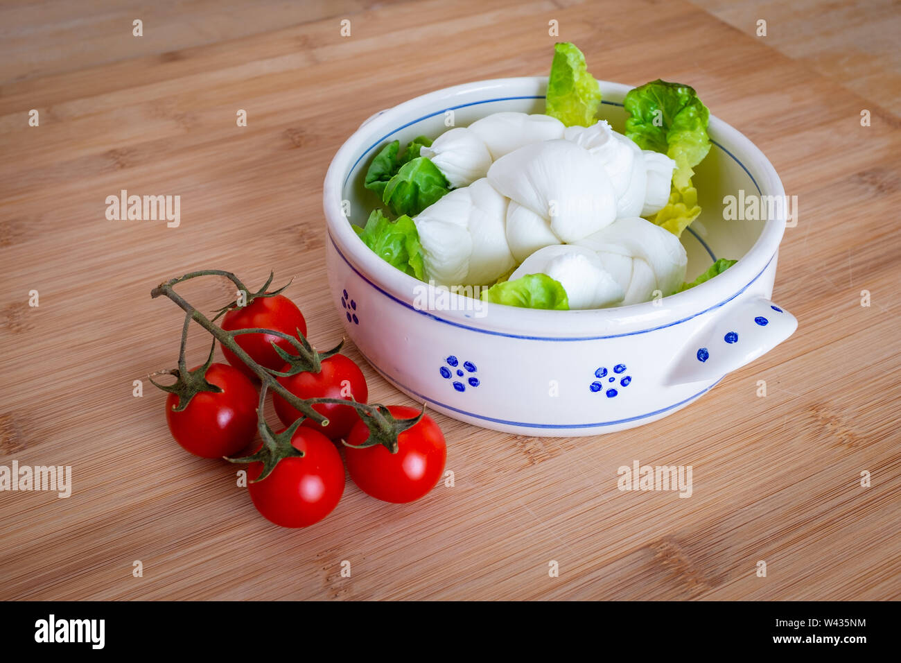 Cow's milk mozzarella cheese handmade in Puglia served in a typical ...