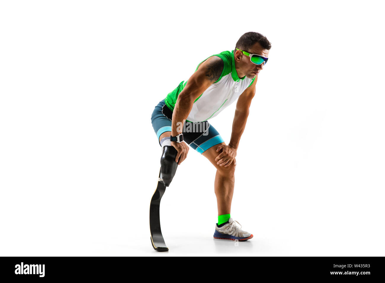 Athlete with disabilities or amputee isolated on white studio ...