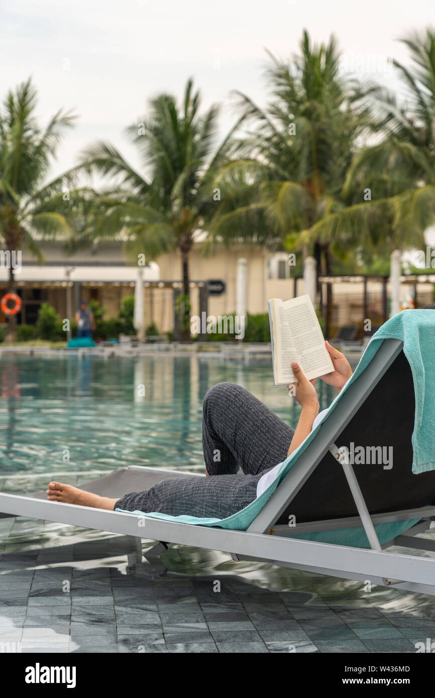 Infinity Pool Woman Palm Tree High Resolution Stock Photography and ...