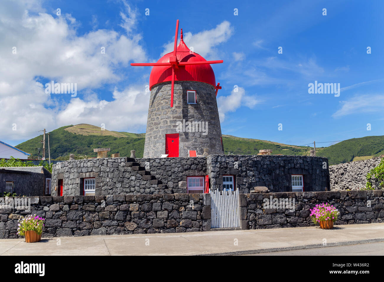 A traditional windmill on Vila da Praia, Graciosa Island, Azores ...