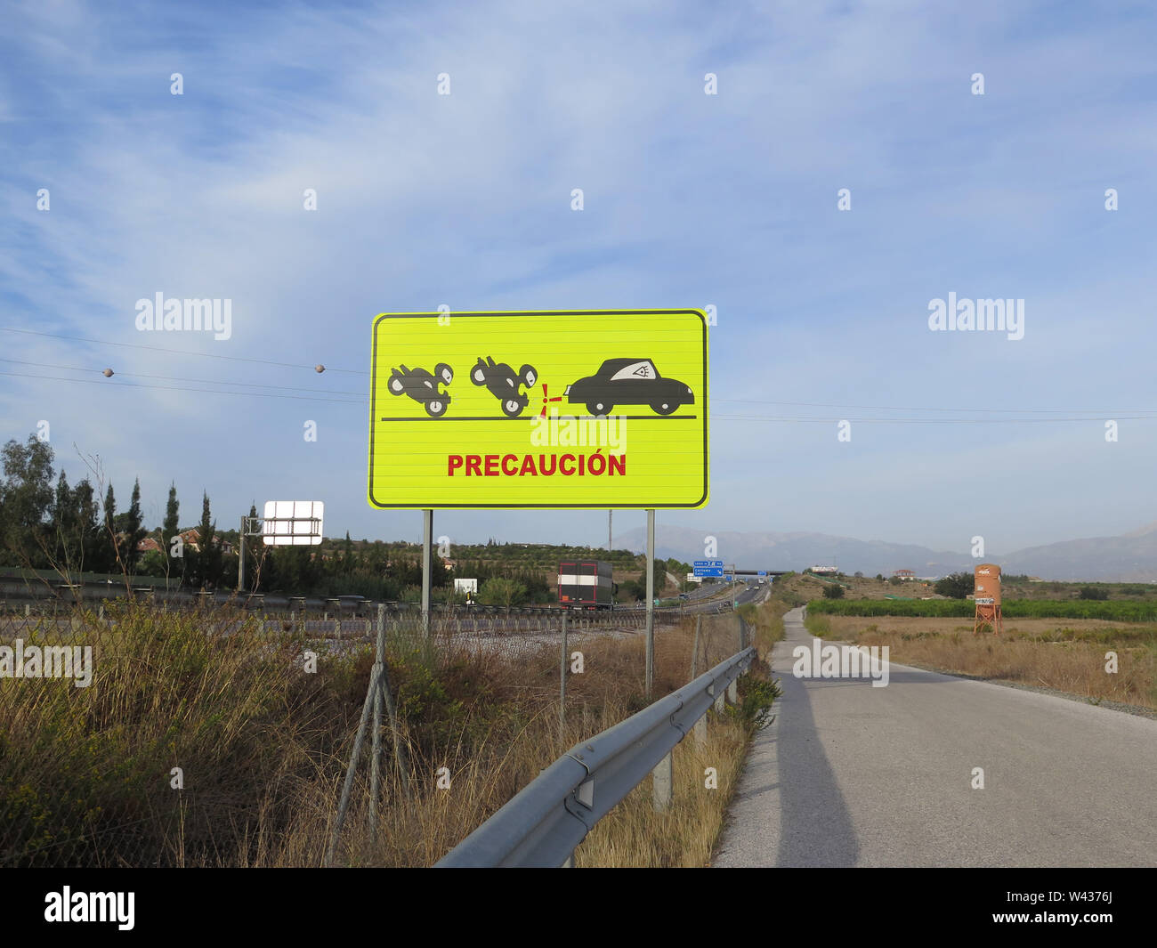 Large yellow road sign warning of congestion and possible queue Stock ...