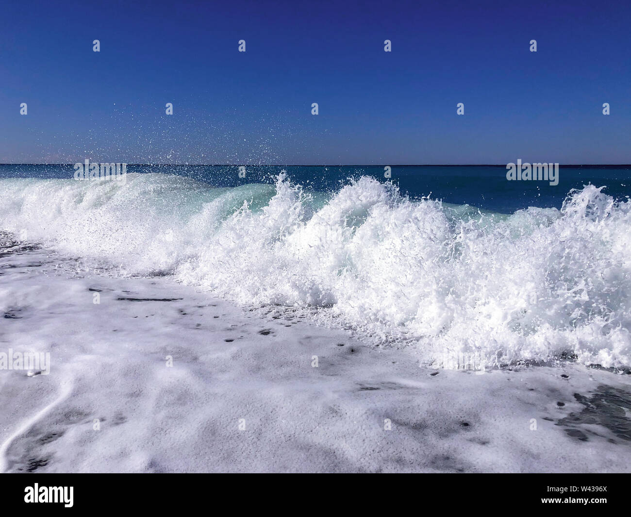 Foamy surf. Morning waves on the Mediterranean Stock Photo - Alamy