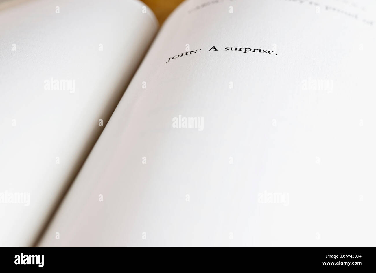 Part of book page with a sentence, macro photography Stock Photo - Alamy