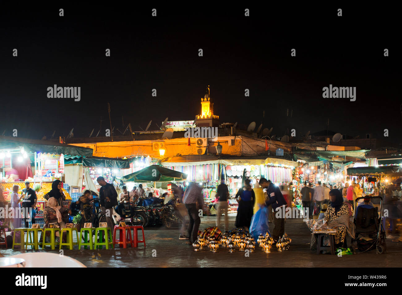 Night market in Marrakech Jema el Fna Evening gathering of locals and ...