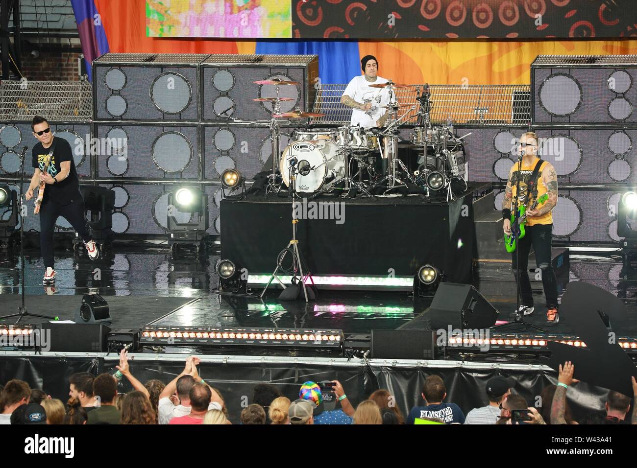 New York, NY, USA. 19th July, 2019. Mark Hoppus, Travis Barker, Tom Delonge, Blink 182 on stage ...