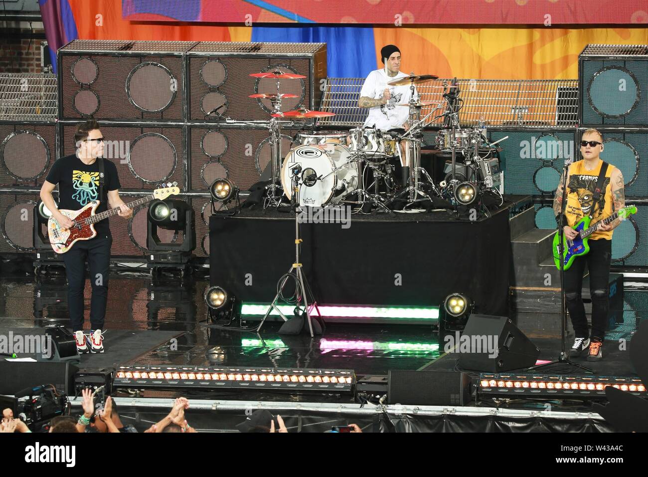 New York, NY, USA. 19th July, 2019. Mark Hoppus, Travis Barker, Tom Delonge, Blink 182 on stage ...