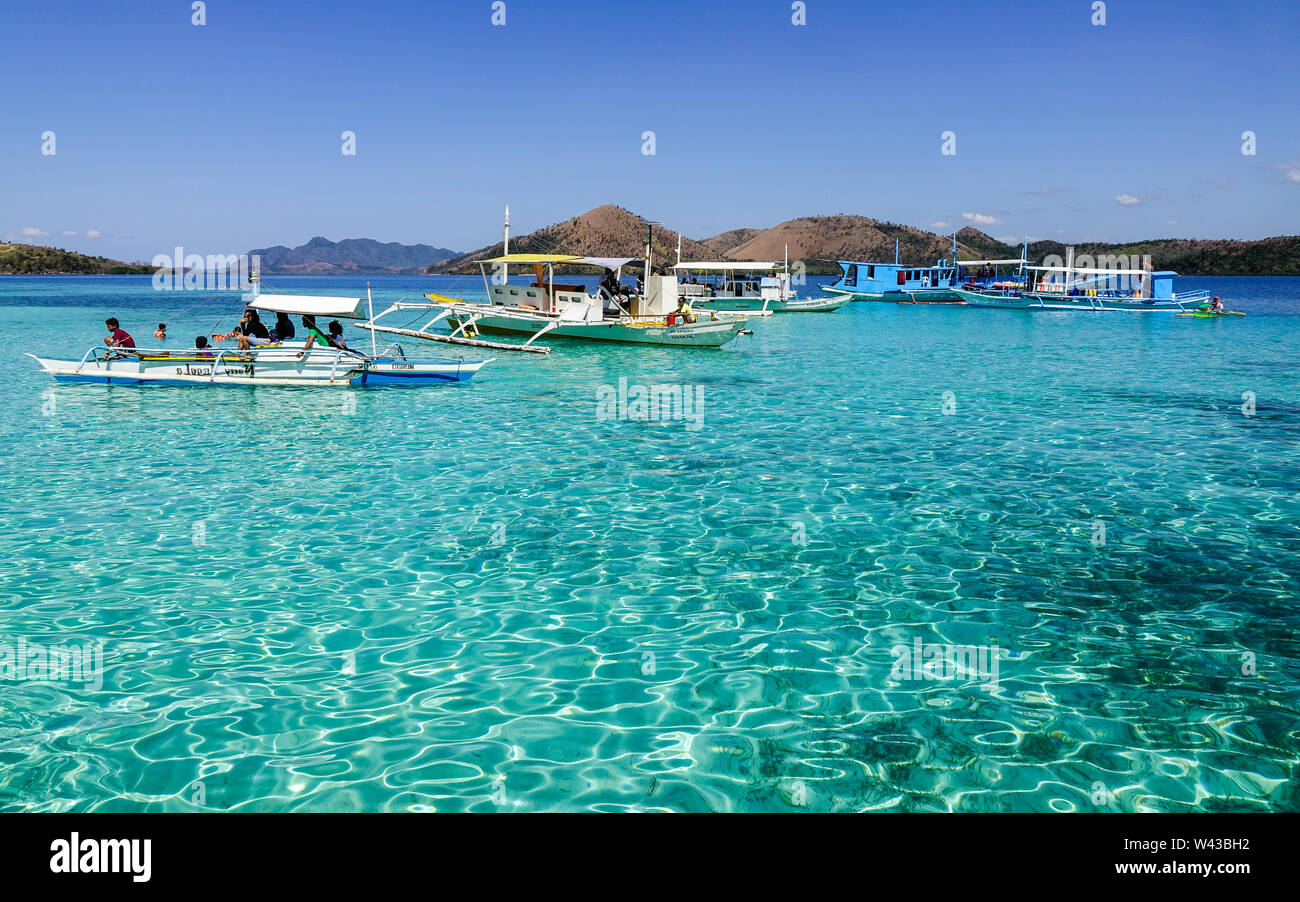 Palawan, Philippines - Apr 11, 2017. Many tourist boats docking on the ...