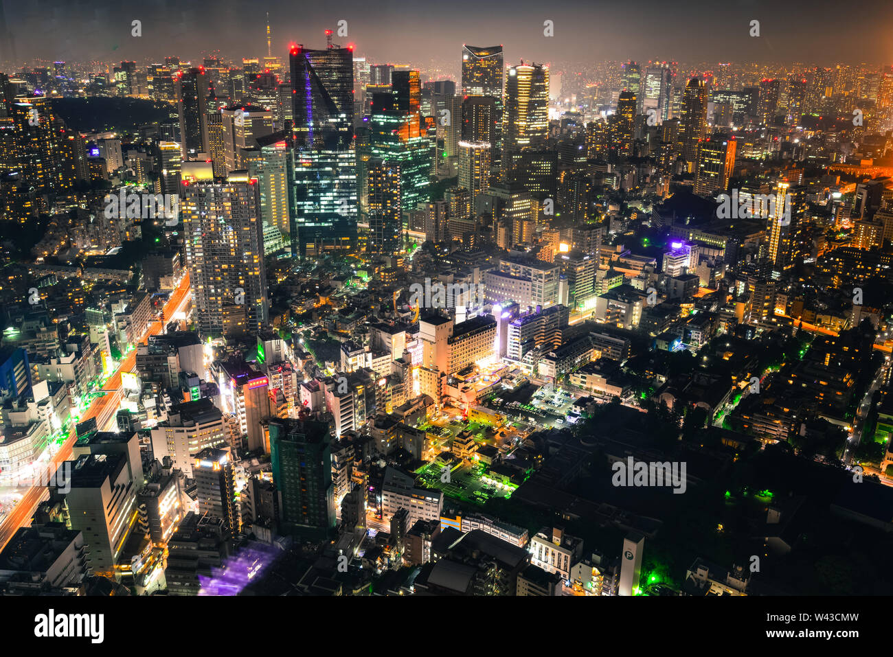 Aerial view of Tokyo at night. Tokyo mixes the ultramodern and the ...