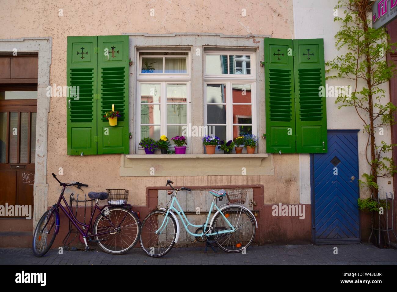 Pretty European Window with Bikes Stock Photo - Alamy