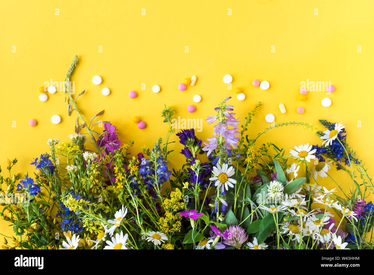 Vitamin capsule flower yellow hi-res stock photography and images - Alamy