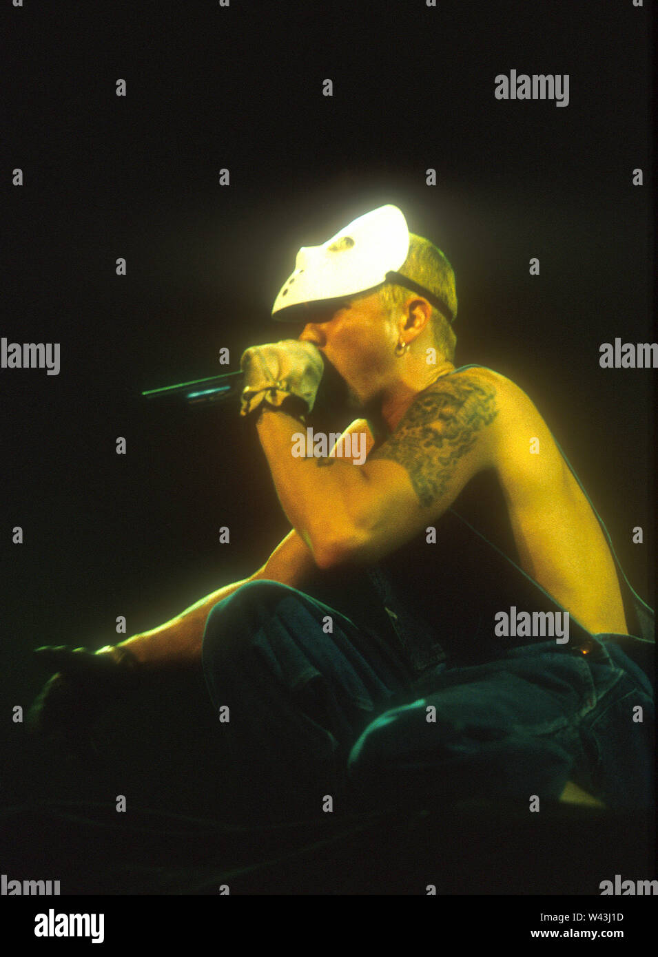 EMINEM American rapper in 2000 wearing a hockey mask in 2000. Photo ...