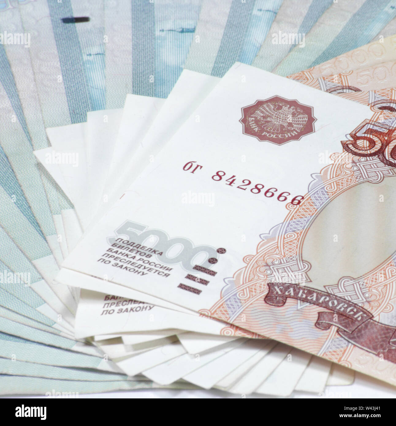 stack of many bond 5000, 1000 Stock Photo - Alamy
