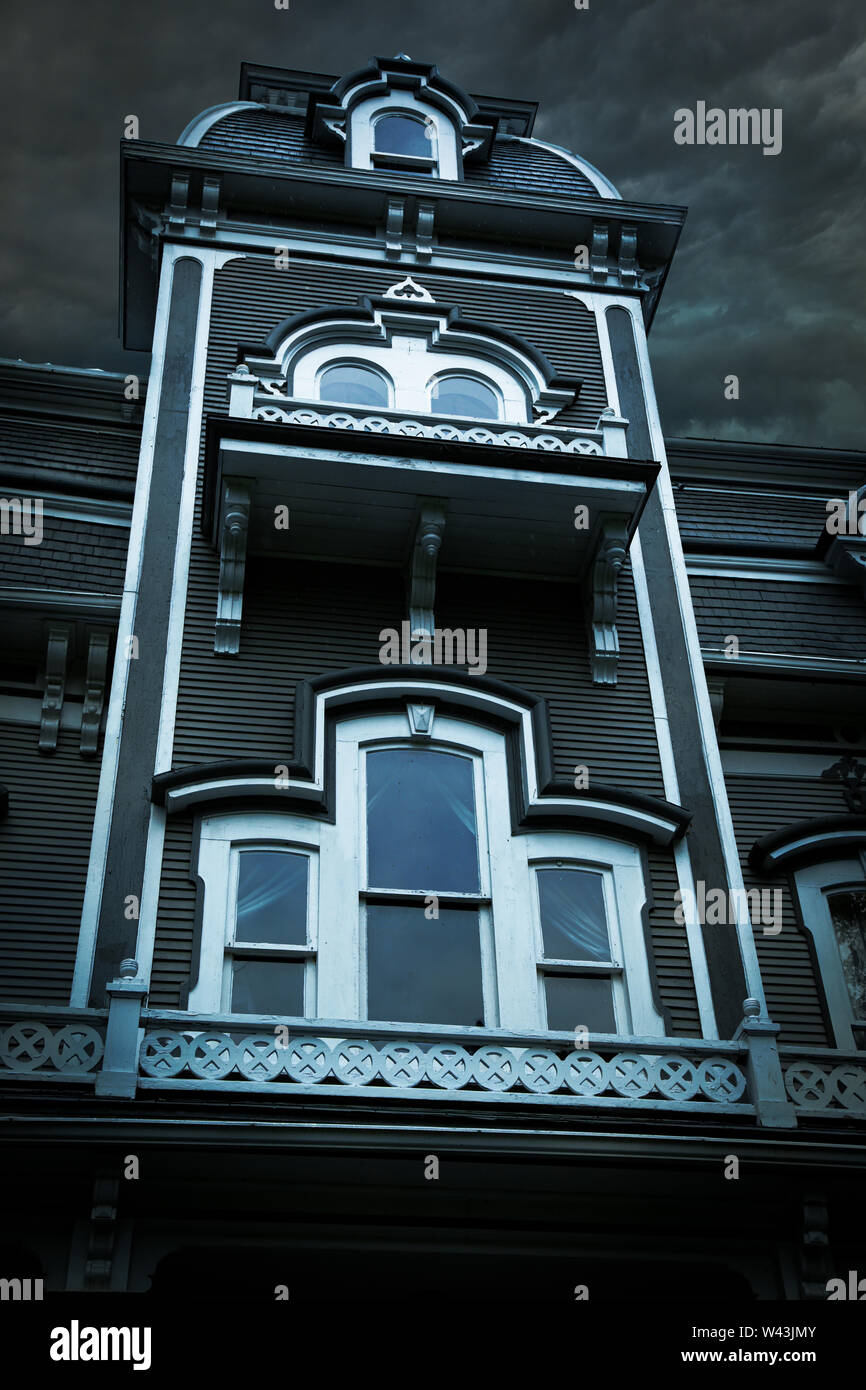 Creepy older style gothic home Stock Photo - Alamy