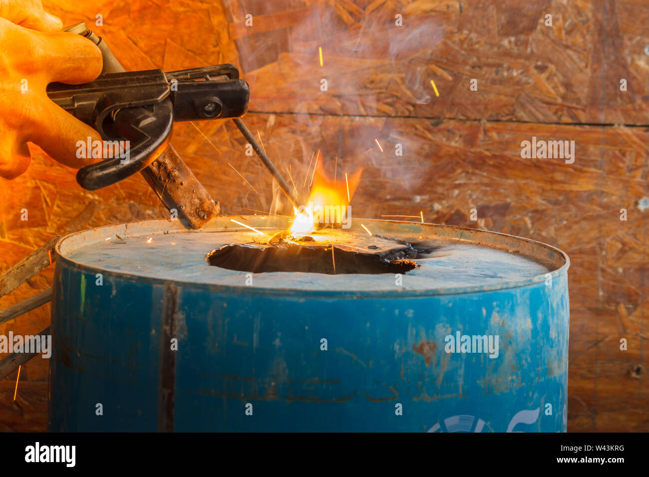 Spark light with welding Process with blue tube metal and bright sparks ...