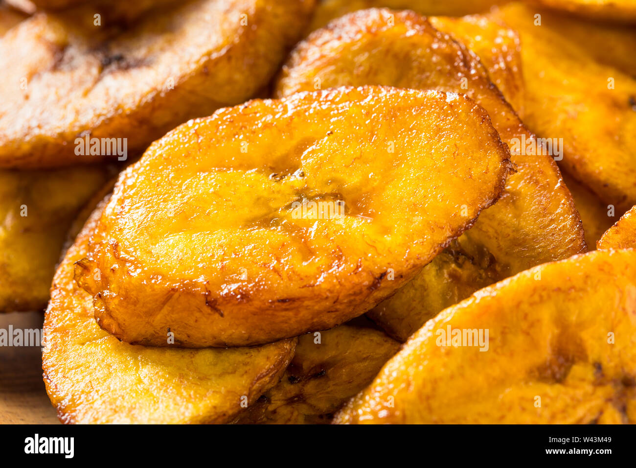 Homemade Yellow Fried Plantains in a Bowl Stock Photo - Alamy