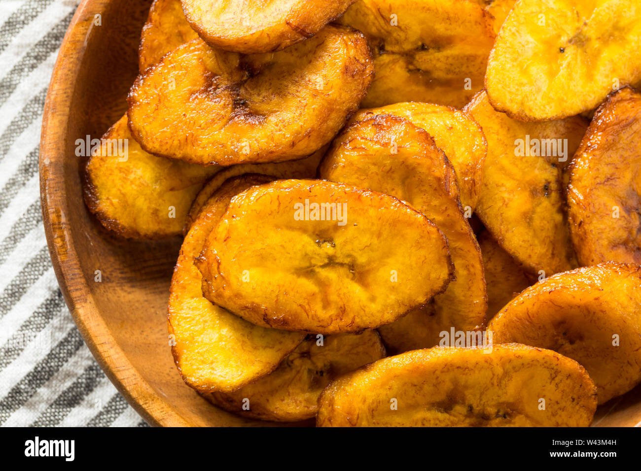 Homemade Yellow Fried Plantains in a Bowl Stock Photo - Alamy