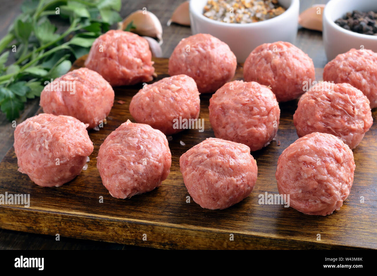 Raw meatballs salt spice hi-res stock photography and images - Alamy