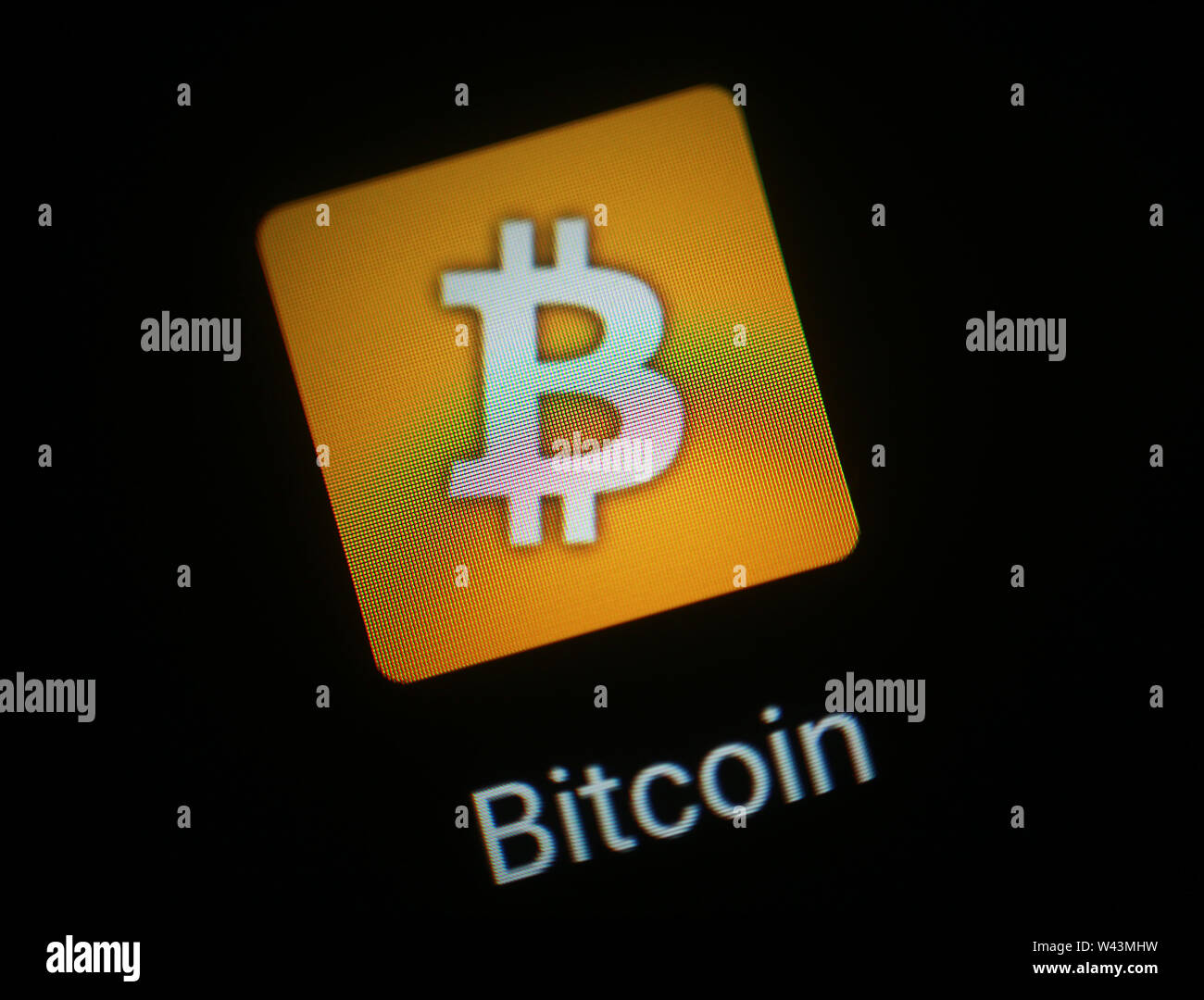 Bitcoin application icon on computer display Stock Photo - Alamy