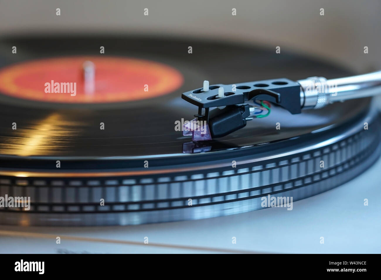 Vinyl Record Player showing the stylist or needle and vinyl red on ...